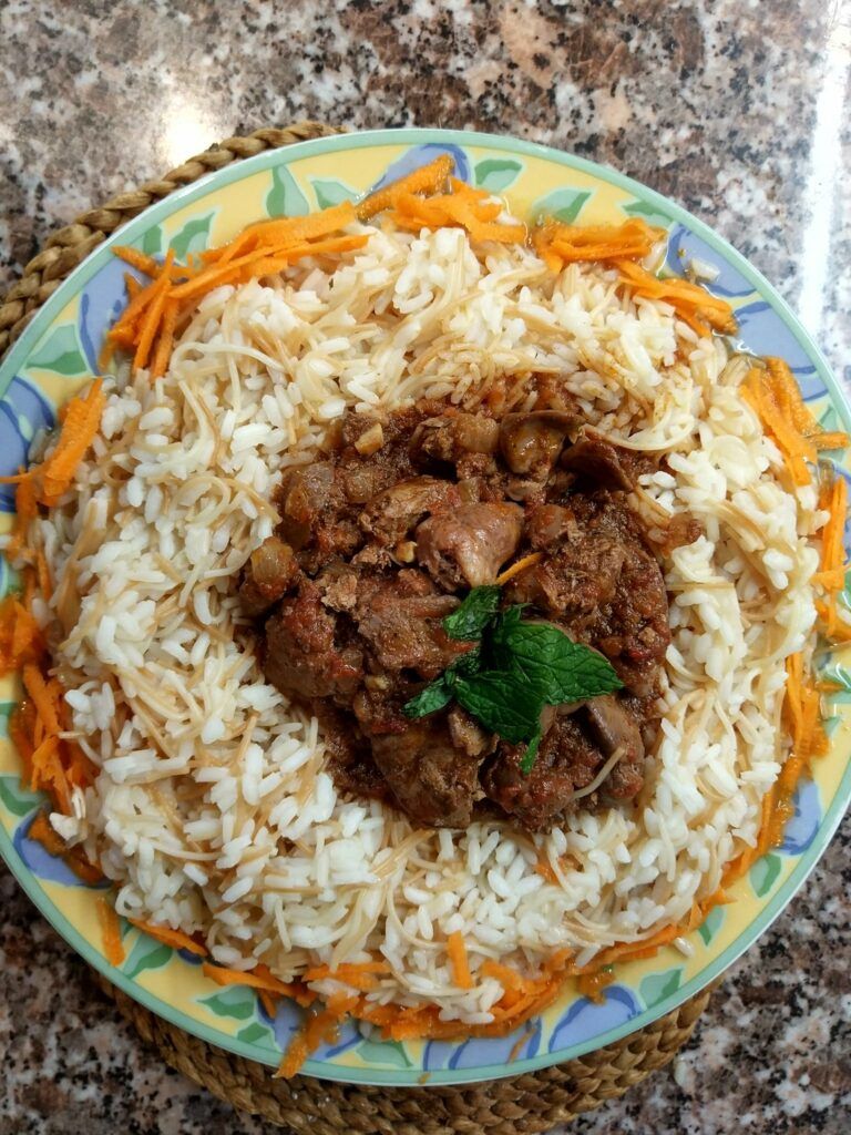 Πολίτικο πιλάφι με κοκκινιστά συκωτάκια κοτόπουλο